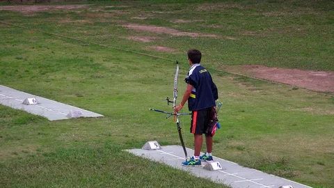 Athlete archer shoots an arrow. 4K. | Stock Video | Pond5