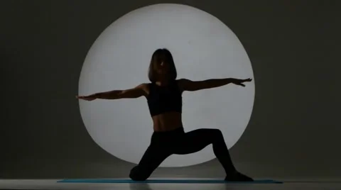 Athlete does the splits and tilts. Back ... | Stock Video | Pond5