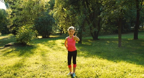 Athlete girl performing a exercise flip ... | Stock Video | Pond5