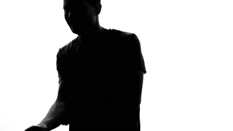 Athlete male shadow holding his elbow, f... | Stock Video | Pond5