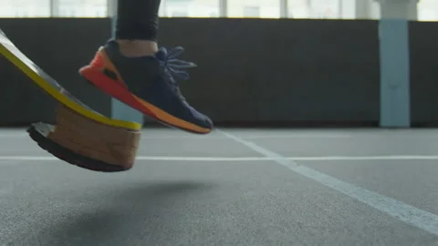 Athlete with Prosthetic Running Blade Ju... | Stock Video | Pond5