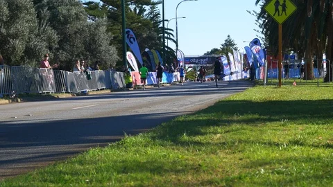 Athletes running across the finish line ... | Stock Video | Pond5