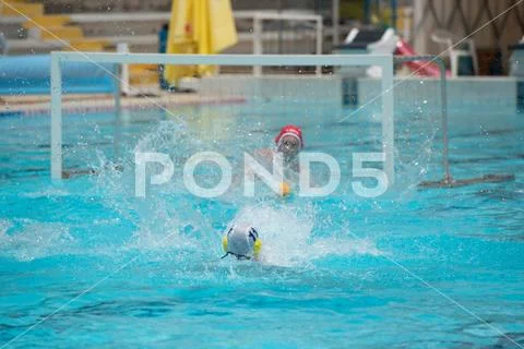 Athletes in swimming pool. Water polo competition ~ Premium Photo ...