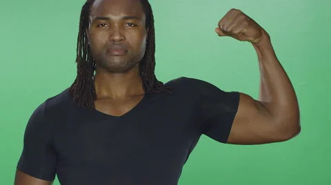 Athletic black man flexing his arm, on a... | Stock Video | Pond5