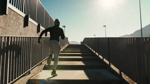 Athletic black man is running up the sta... | Stock Video | Pond5