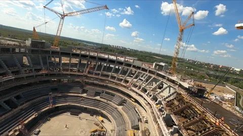Athletic stadium building and tower cran... | Stock Video | Pond5
