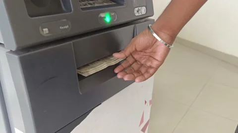 ATM Cash withdrawal - Indian rupees in A... | Stock Video | Pond5