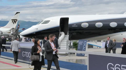 Attendees of EBACE look at Gulfstream G7... | Stock Video | Pond5