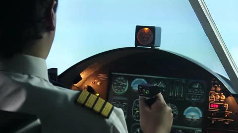 Attentive pilot controlling passenger ai... | Stock Video | Pond5