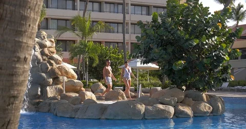 Attractive Couple Steps into Hot Tub at ... | Stock Video | Pond5