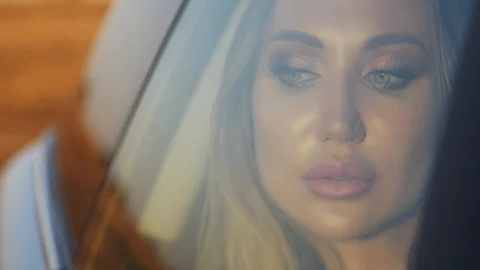 attractive female face behind the glass ... | Stock Video | Pond5