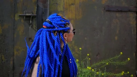 Attractive girl with blue dreadlocks dan... | Stock Video | Pond5