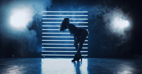 Attractive girl dancing seductively in t... | Stock Video | Pond5