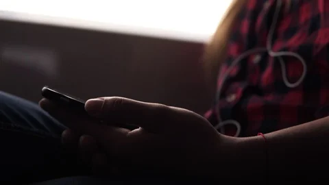 Attractive girl sitting in the shadow in... | Stock Video | Pond5