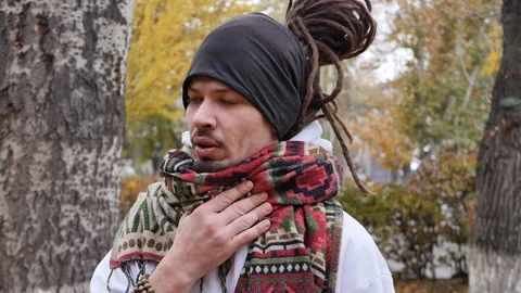 Attractive guy with dreadlocks sad and s... | Stock Video | Pond5
