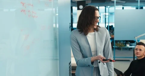 Attractive mid-30s female manager leadin... | Stock Video | Pond5