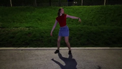 Attractive teenage girl dancing outside ... | Stock Video | Pond5