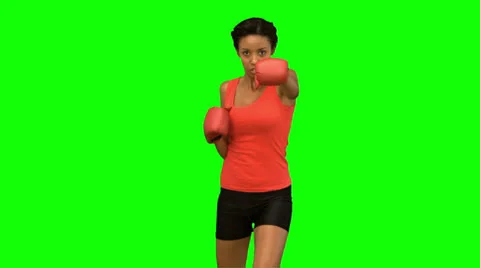 Attractive woman boxing on green screen | Stock Video | Pond5