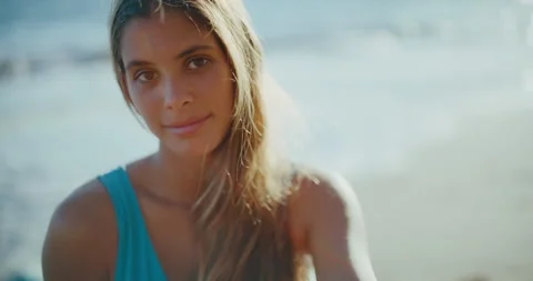 Attractive Young Influencer at the Beach | Stock Video | Pond5