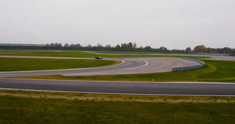 audi R8 drifting racetrack aerial flyby ... | Stock Video | Pond5