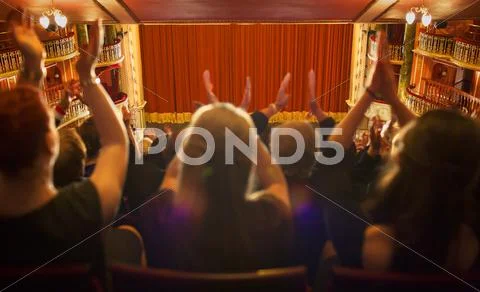 Stock Photograph: Audience clapping in theater #50900917
