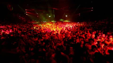 Audience in large stadium at rave party | Stock Video | Pond5