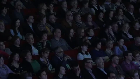 Audience sitting in a concert hall and l... | Stock Video | Pond5