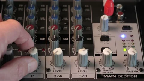Audio mixer switches channel 1 to 6 hand... | Stock Video | Pond5