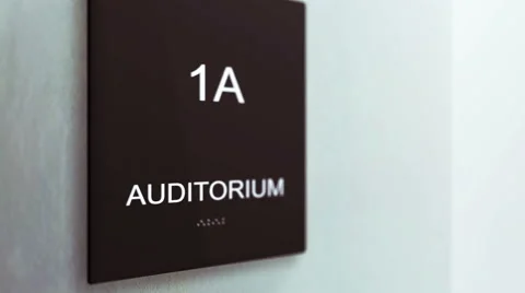 Auditorium Sign CU in an ambient Corpora... | Stock Video | Pond5