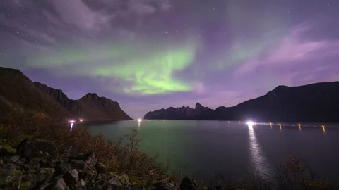 Aurora Borealis and fish farm lights | Stock Video | Pond5
