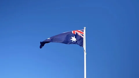 Australian flag moving in the wind in sl... | Stock Video | Pond5