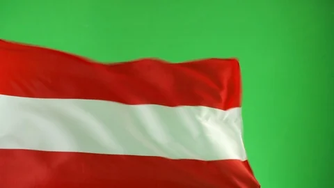 Austria Flag flying in front of Green Sc... | Stock Video | Pond5