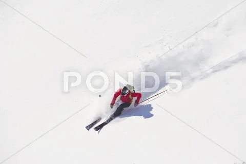 Austria, Zuers, Young Man Doing Telemark Skiing On Arlberg Mountain ...