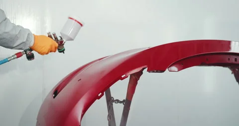 Auto Painter Spraying Red Paint on Car D... | Stock Video | Pond5
