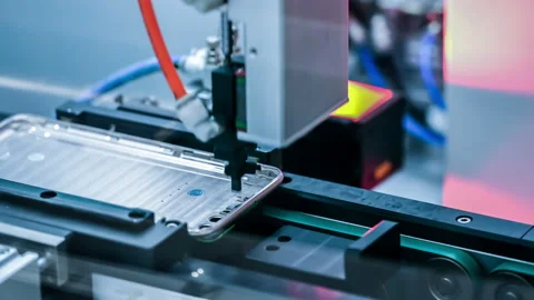 Automated machine in a smartphone assemb... | Stock Video | Pond5