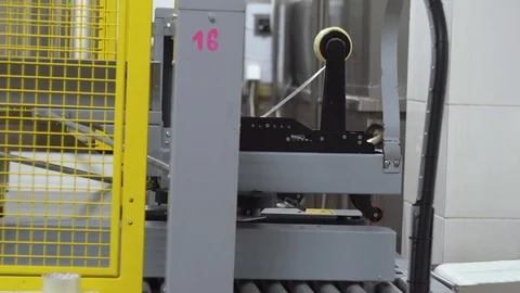 Automatic adhesive taping of a cardboard... | Stock Video | Pond5