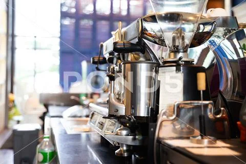 Automatic coffee machine. In a coffee shop. Side view of electric ...