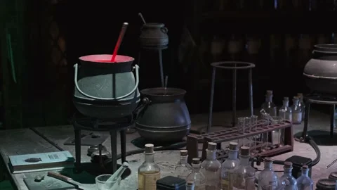 Automatic Wooden Stick Mixing Red Potion... | Stock Video | Pond5