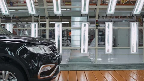 Automobile plant, new car body moves alo... | Stock Video | Pond5