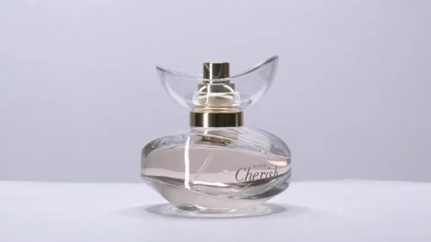 Avon Cherish. Perfume bottle rotation in... | Stock Video | Pond5