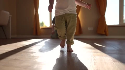 baby baby first steps. happy family a ki... | Stock Video | Pond5