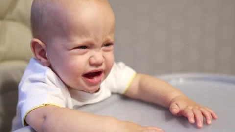 baby child choke on hard food sitting hi... | Stock Video | Pond5