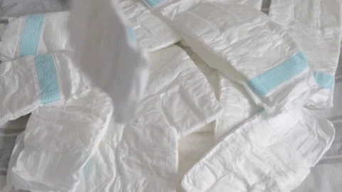 baby diapers in pack woman mother hand o... | Stock Video | Pond5