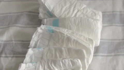 baby diapers in pack woman mother hand o... | Stock Video | Pond5