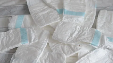 baby diapers in pack woman mother hand o... | Stock Video | Pond5