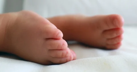 Baby feet and toes close-up while sleepi... | Stock Video | Pond5