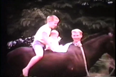 baby girl rides horse with little boy, e... | Stock Video | Pond5