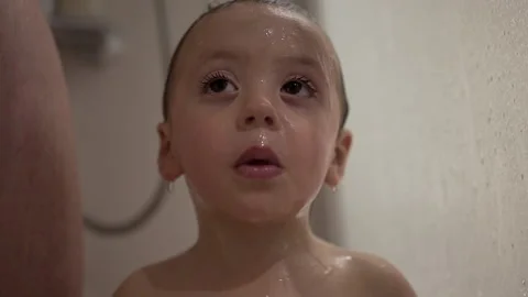 Baby toddler child rubbing face and eyes... | Stock Video | Pond5