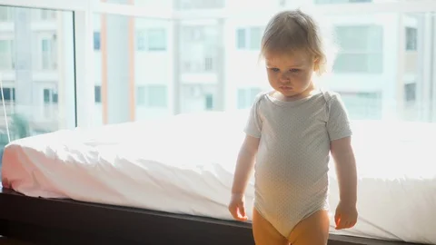 the baby urinates in a diaper. 4k UHD. S... | Stock Video | Pond5