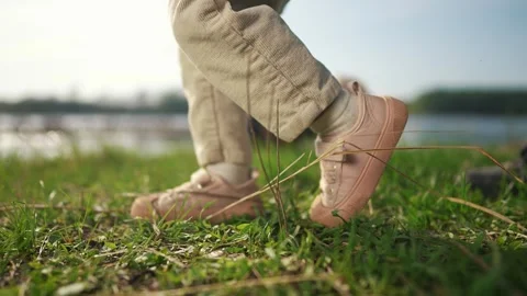 baby walk in the park takes his first st... | Stock Video | Pond5